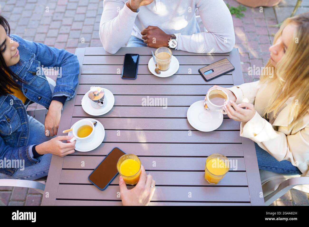 Diverse group drinking tea hi-res stock photography and images - Alamy