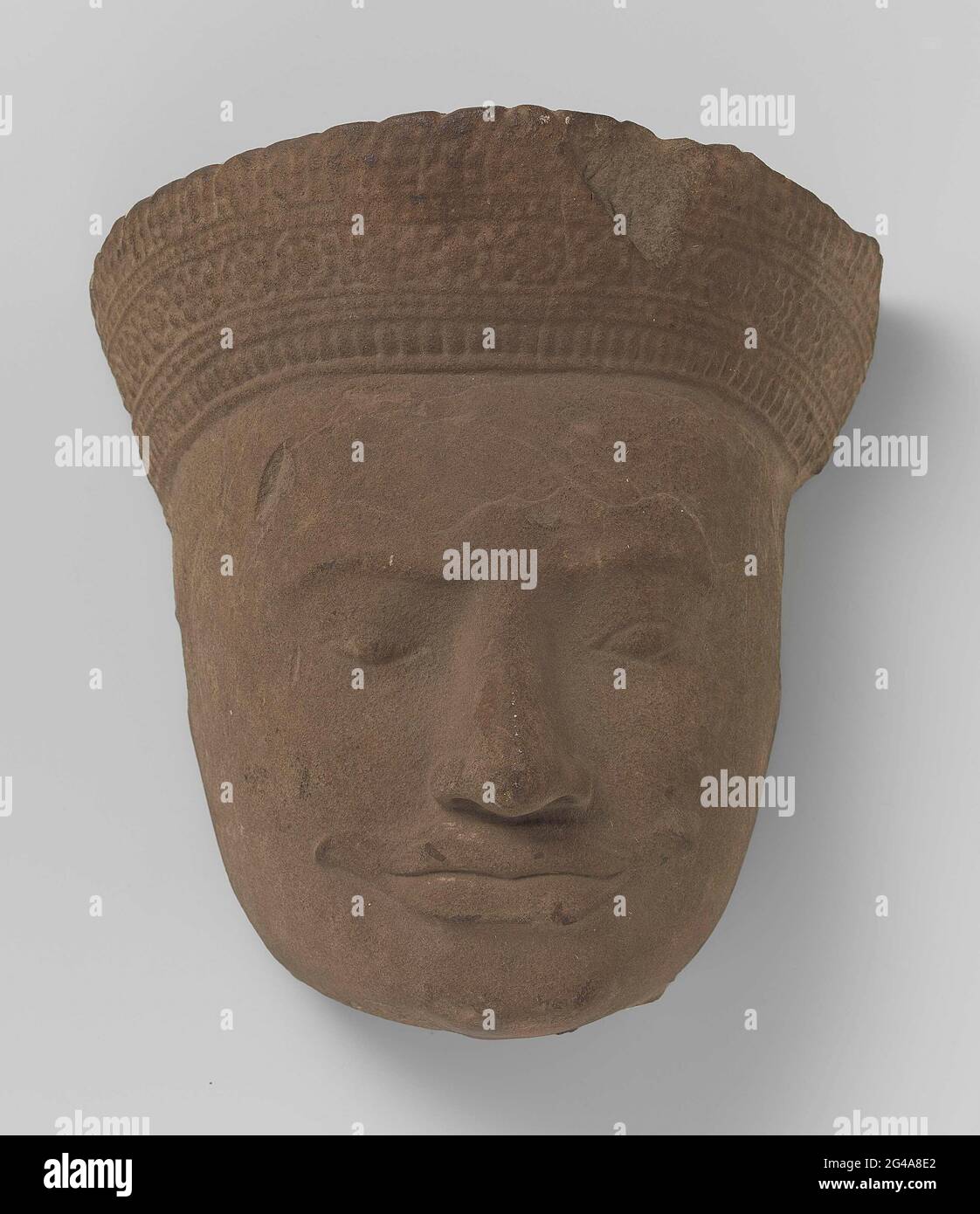 Fragment of a sculpture. Head of a deity with diadem; Headdress (Mukuta ...