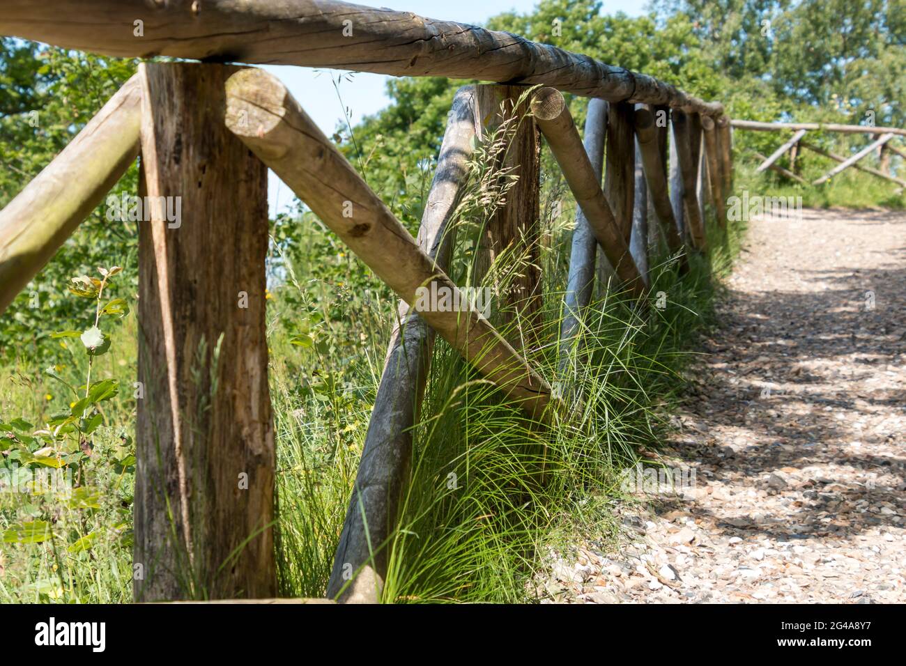 Ry, Denmark - June 16 2021: Old wooden fence surrounded by beautiful ...