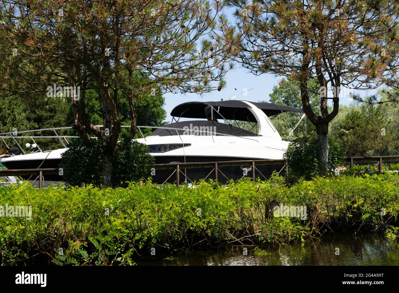 Picture of a floating fishing boat Stock Photo - Alamy