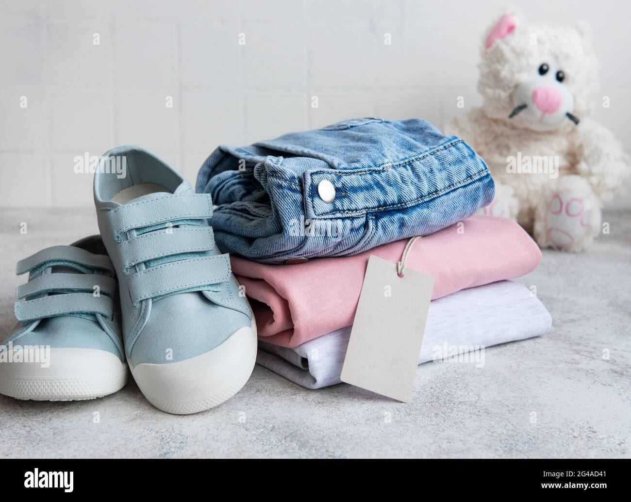 Clothes for kids. Online shopping concept. Delivery of clothes Stock ...