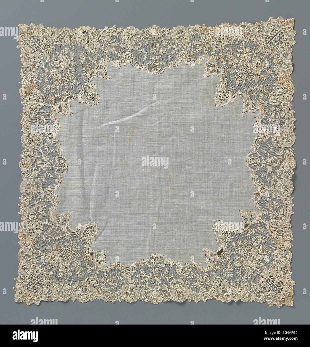 Handkerchief with a border of needle side with corner crossheads ...
