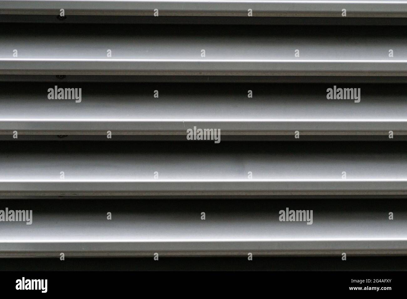 A closeup of metal blinds gate background Stock Photo - Alamy