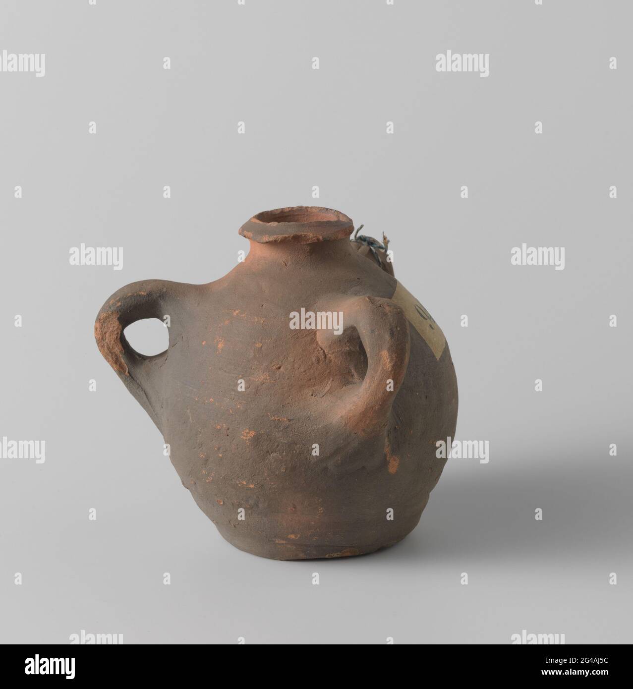 Fire pot. Fire or stink pot of pottery with three ears Stock Photo - Alamy