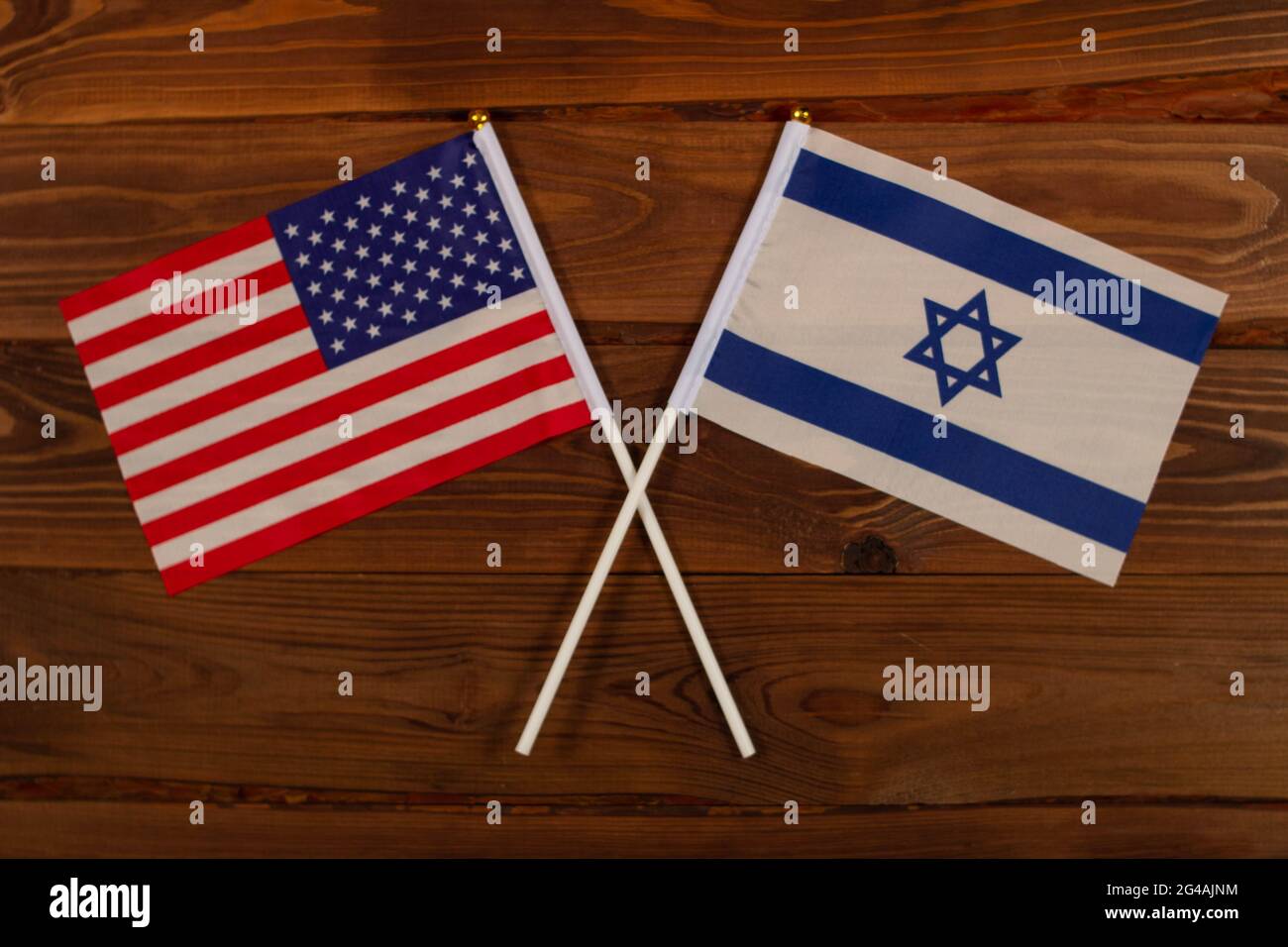 Flag of USA and flag of Israel crossed with each other. USA vs Israel ...
