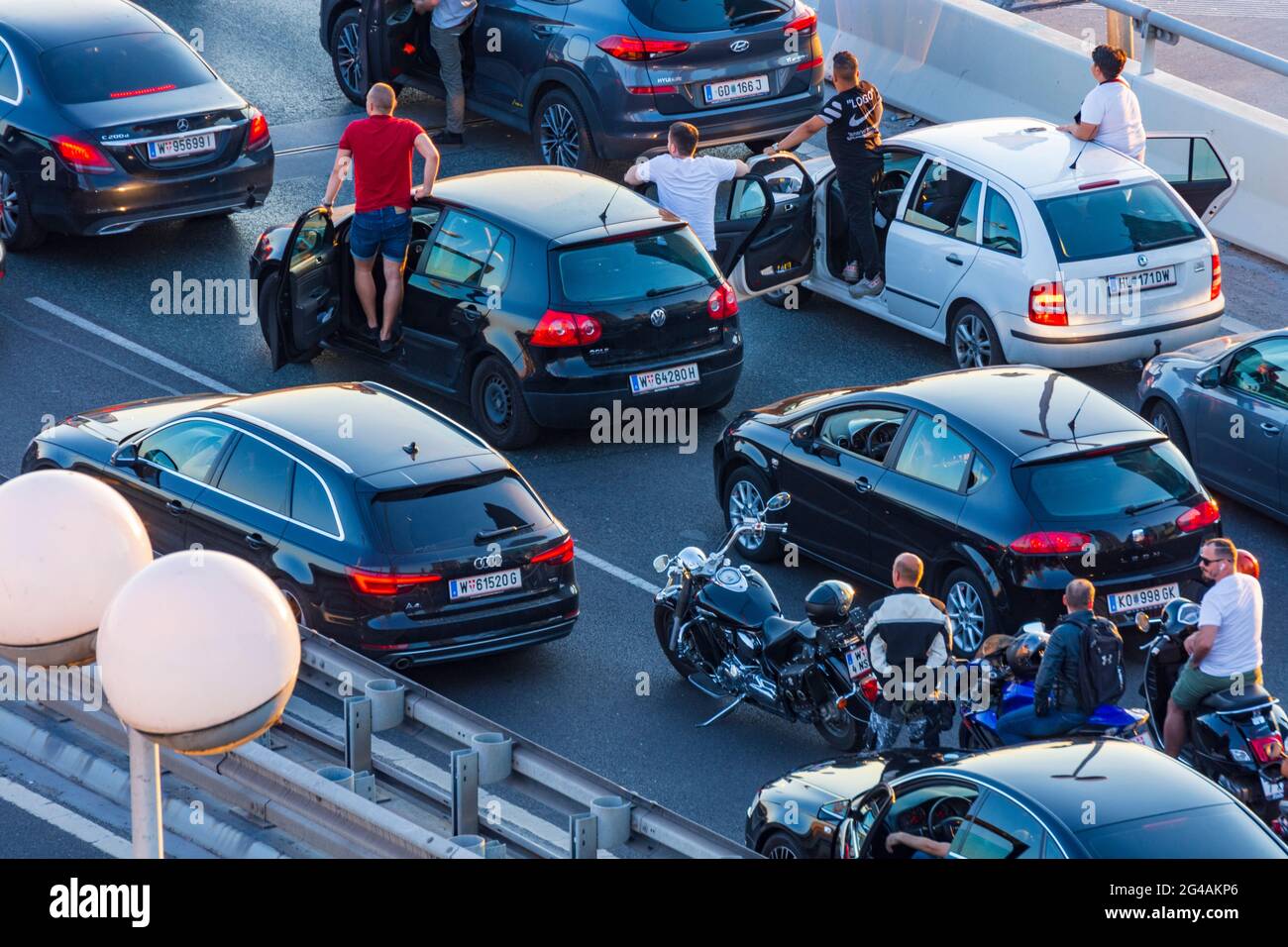 Wien, Vienna: cars and motorbikes in a traffic jam, on bridge ...