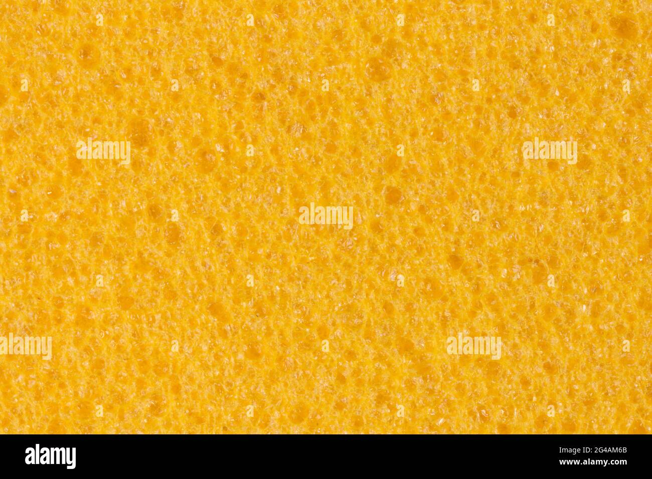 Saturated yellow foam, EVA texture with porosity. Background for ...