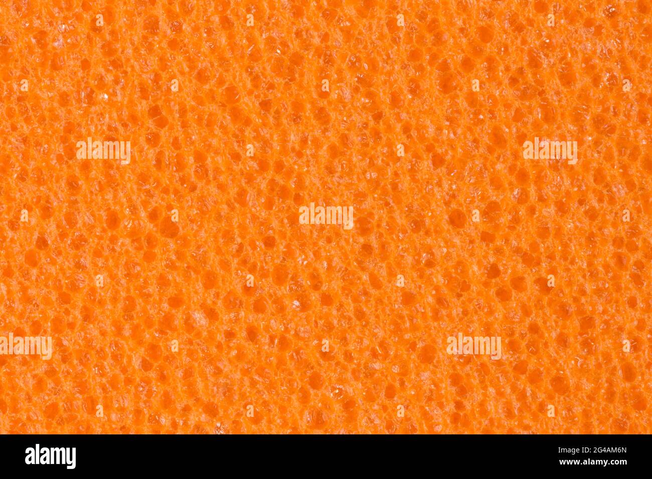 Warm orange foam, EVA texture with contrast porosity. Background for ...