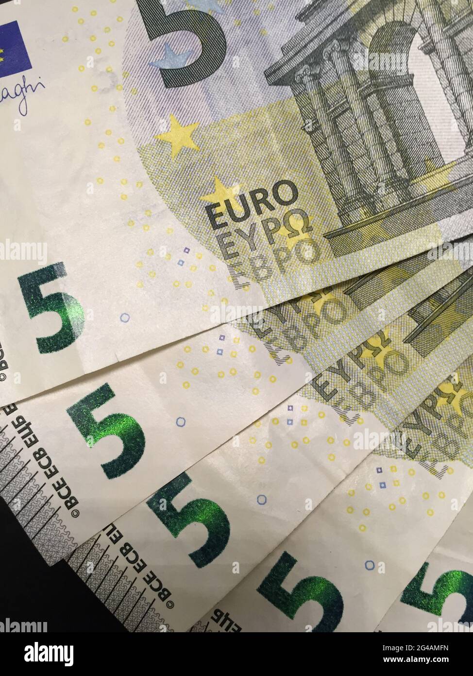 a vertical shot of five euro banknotes semicircle Stock Photo - Alamy