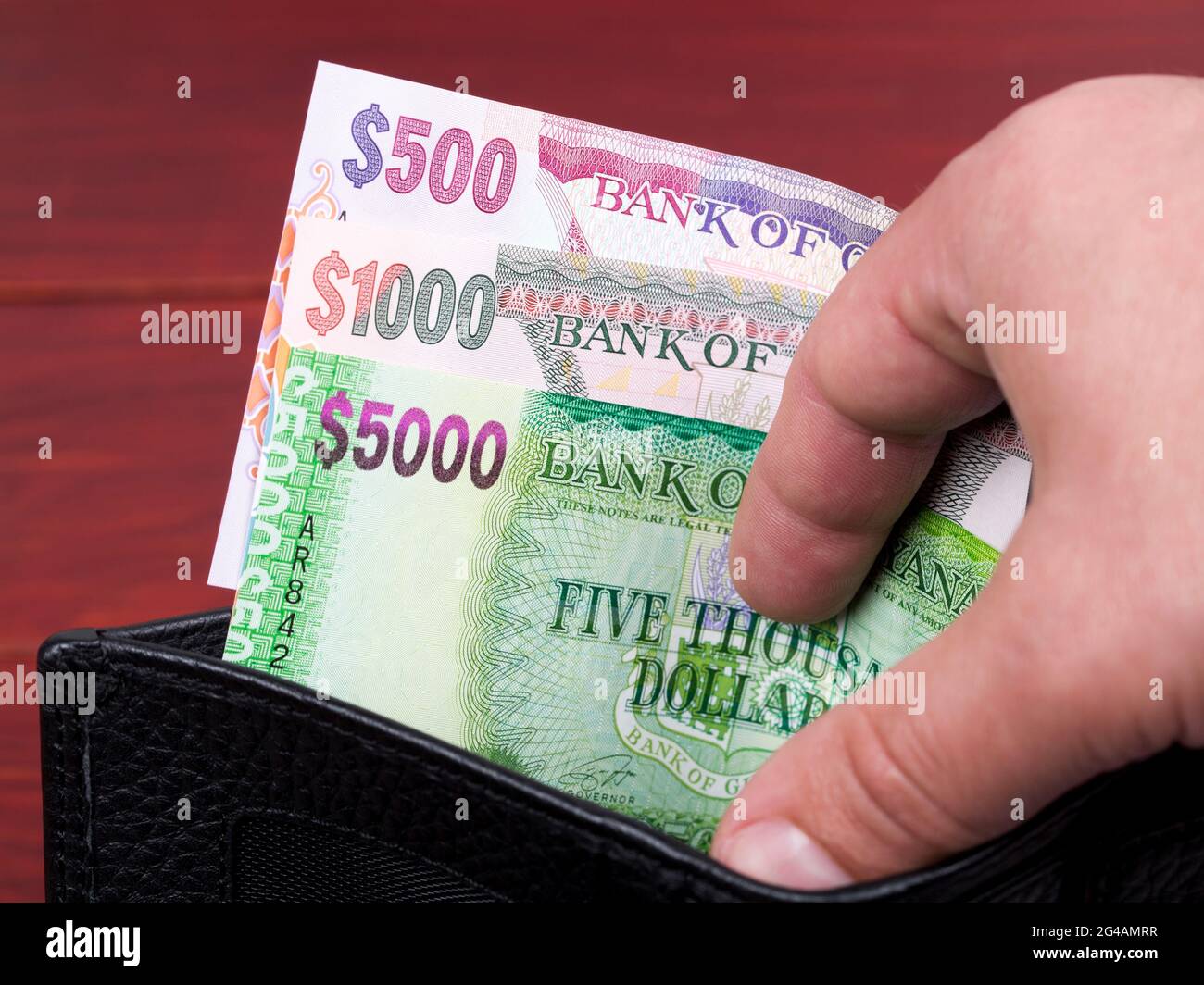 Guyana dollar currency sign hi-res stock photography and images - Alamy