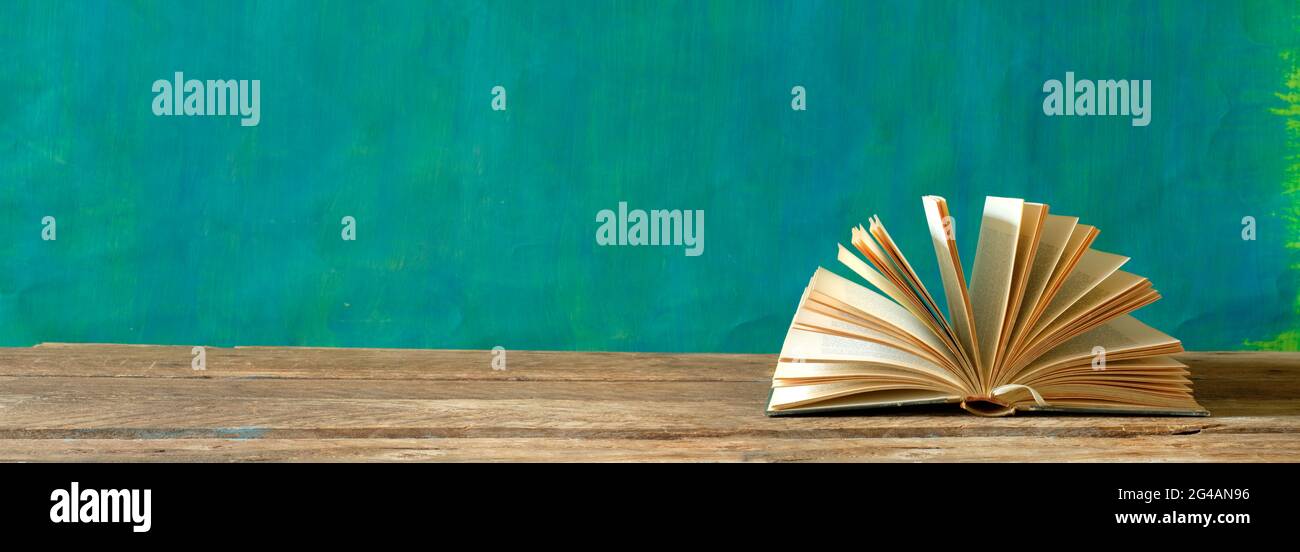 open book on green background. Reading,literature,education,library ...
