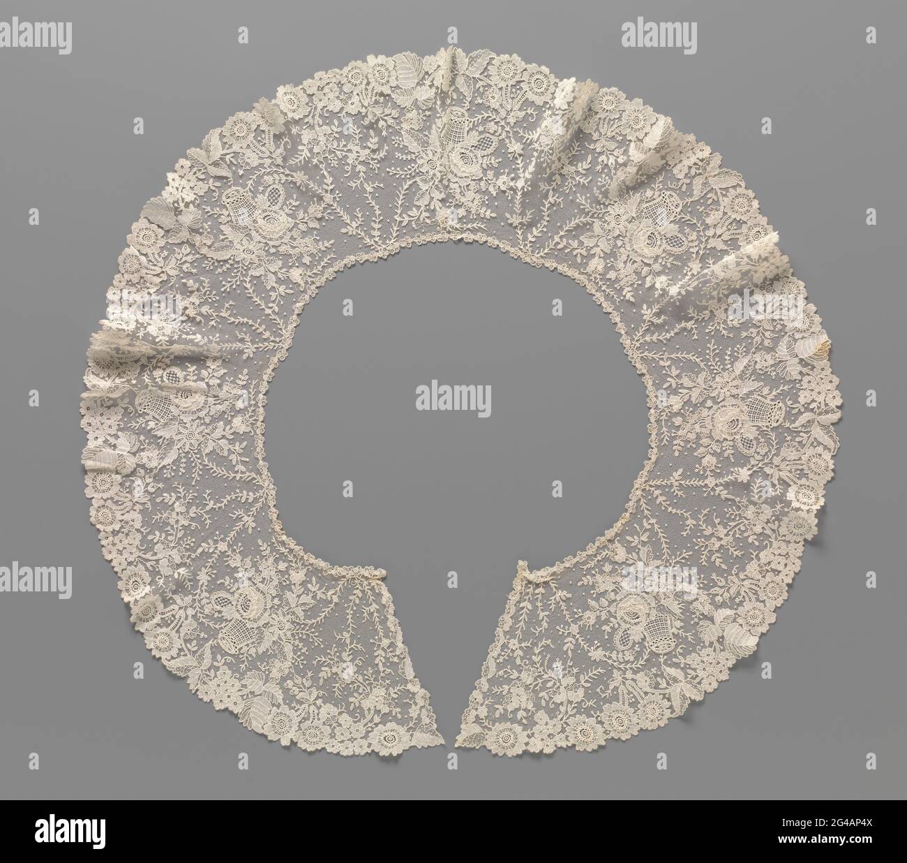 Berthe of needle side with floral baskets and leaf garlands. Berthe ...