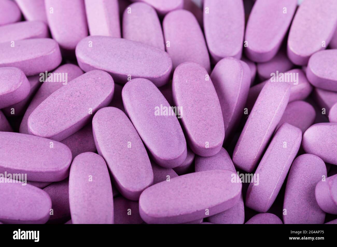 Pills scattered as a background. Global health care concept ...