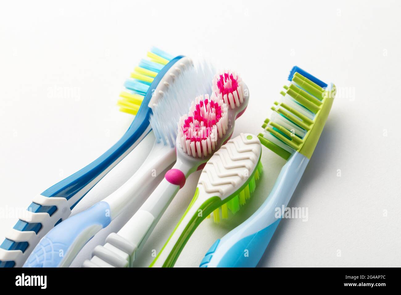 Toothbrushes on a white background. Concept toothbrush selection. Oral ...