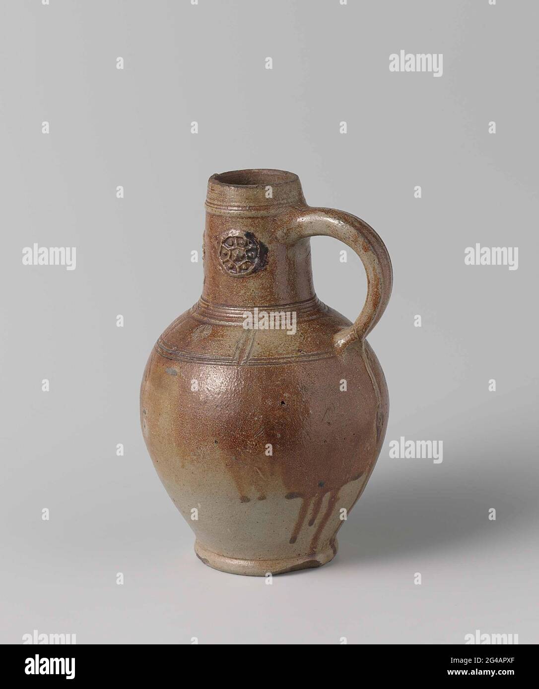 Jug. Conversely egg-shaped jug of stoneware, with a cylindrical neck ...