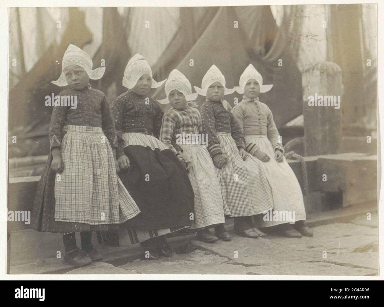 Group portrait of five girls in traditional costume, presumably in ...