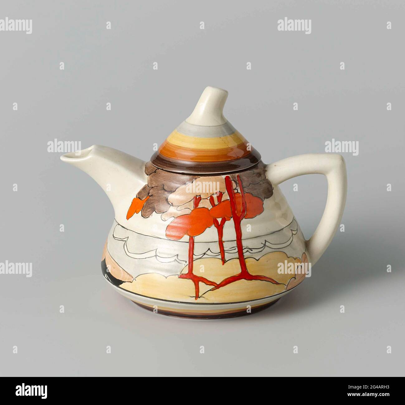 Teapot painted with a landscape with trees. Teapot of earthenware ...