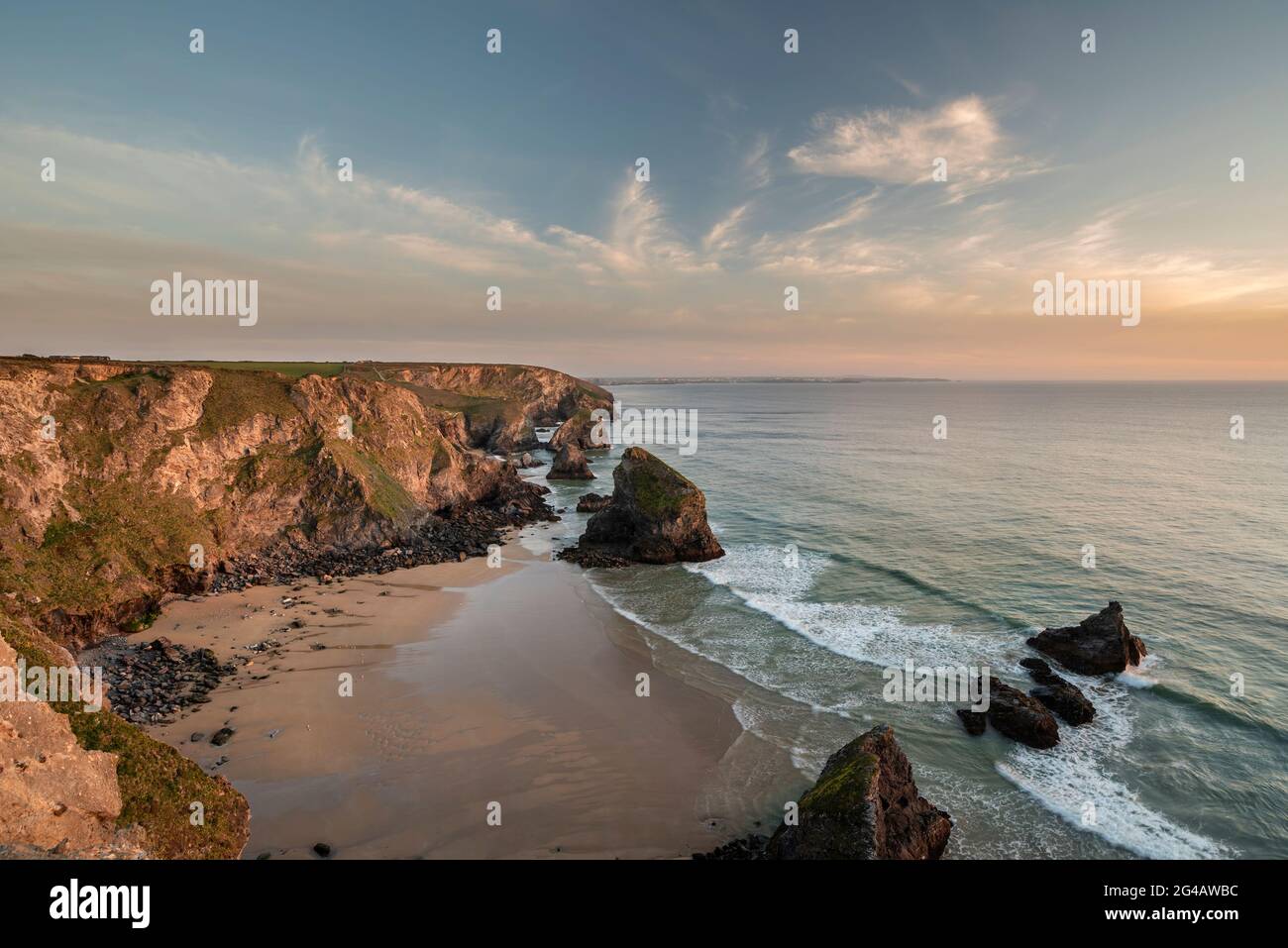 Stunning landscape image during golden hour on Cornwall coastline at ...