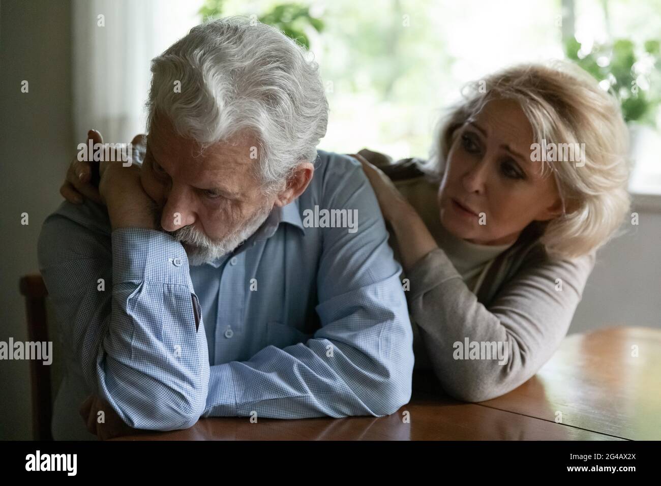 Caring old wife comfort unhappy mature husband after fight Stock Photo ...