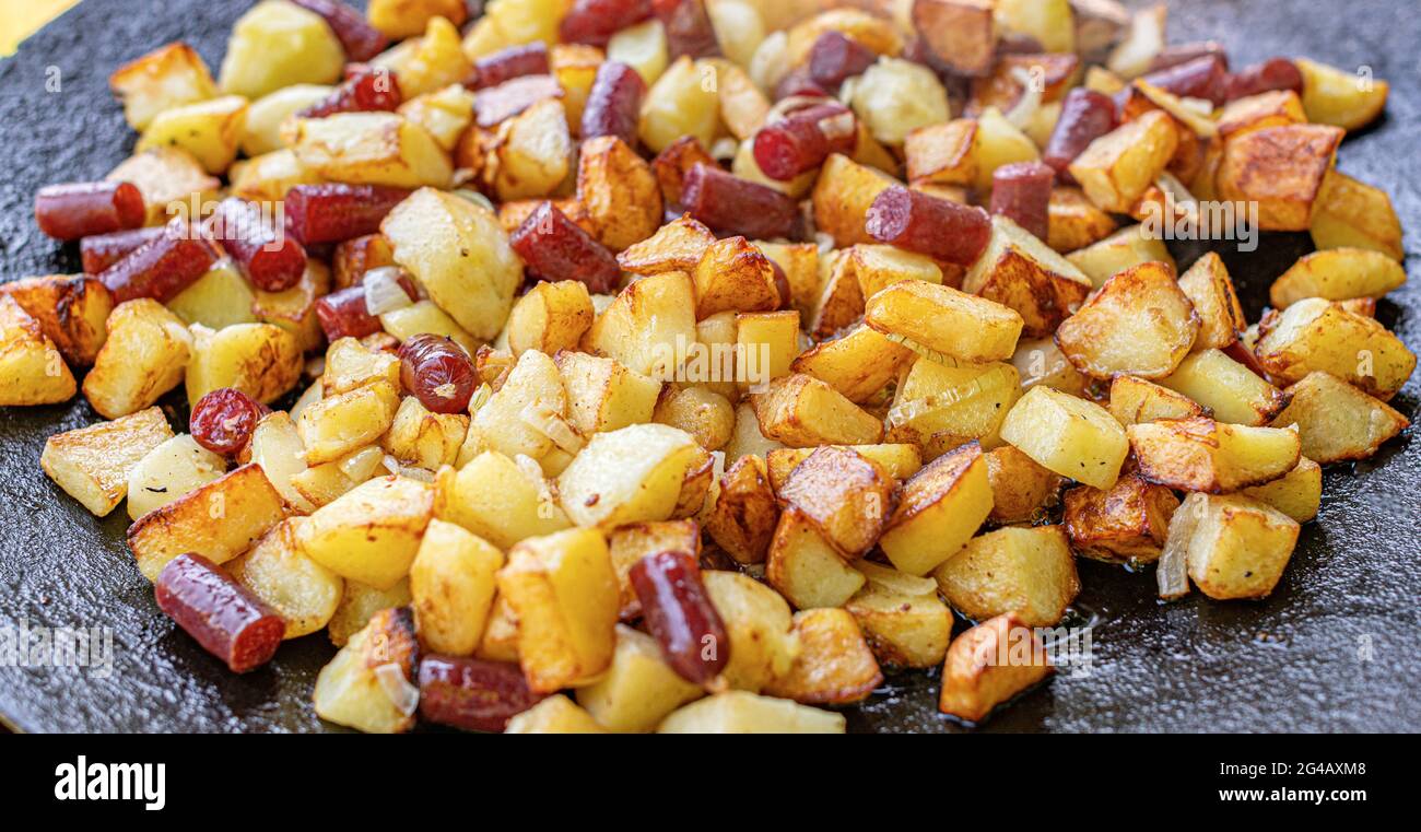 Cooking potatoes on fire barbecue hi-res stock photography and images ...