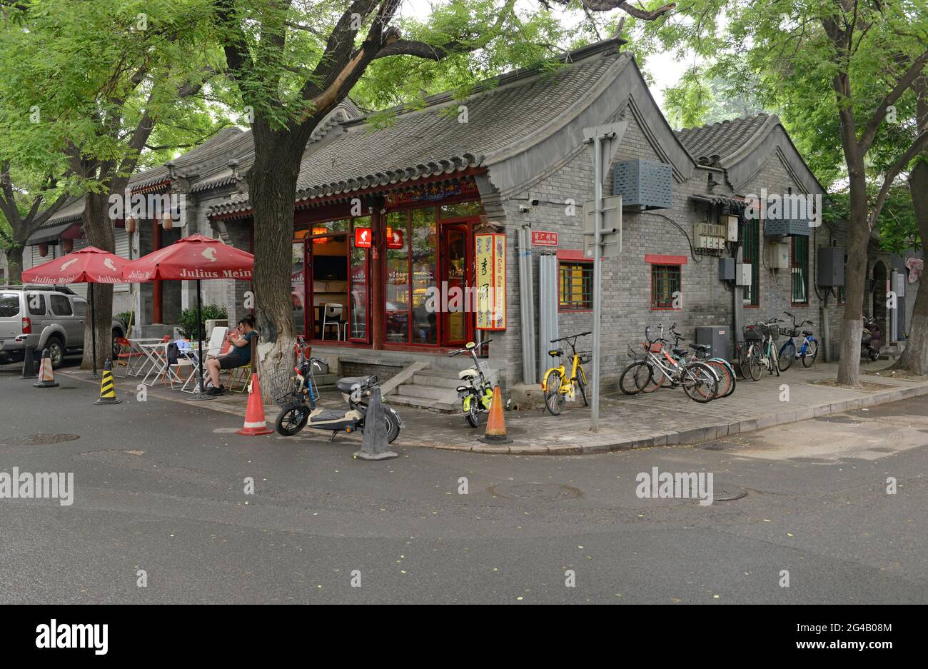 A cafe and shop on the corner of two Hutong alleys in Dongcheng ...