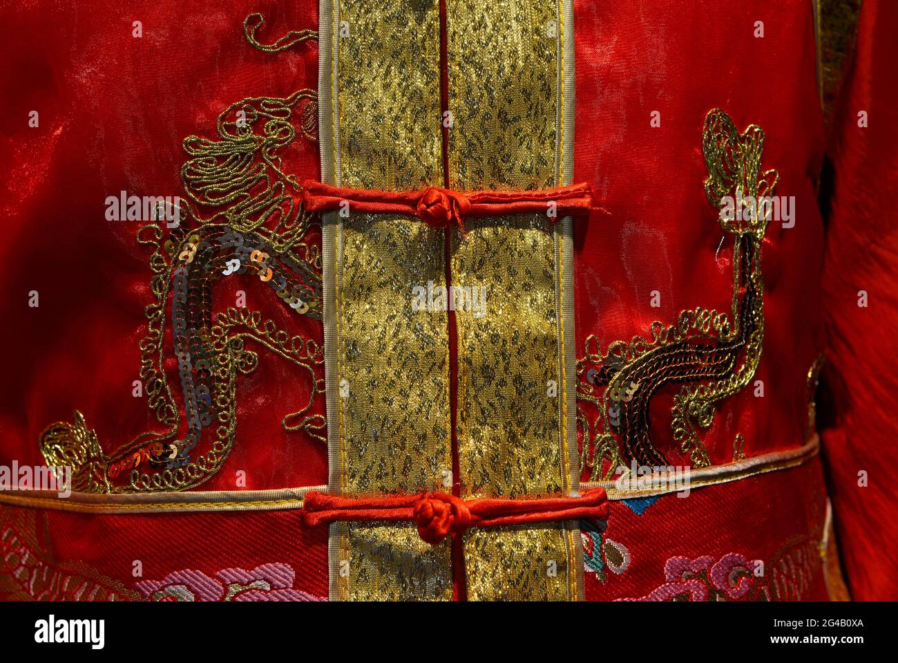 Cloth buttons on a traditional Chinese dress called a Qipao in a ...