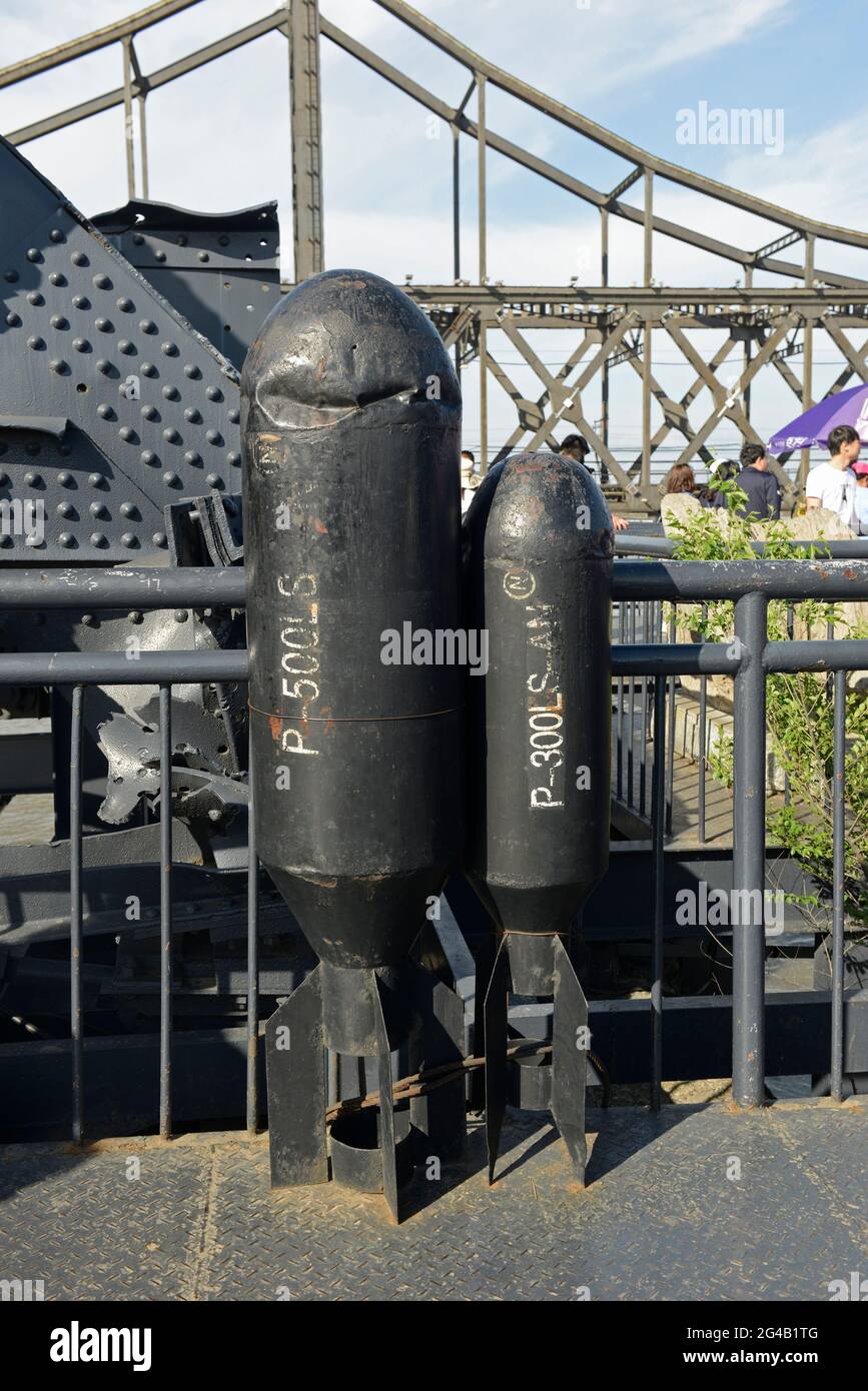 Two old bombs displayed on the old, bomb-damaged, bridge across the ...