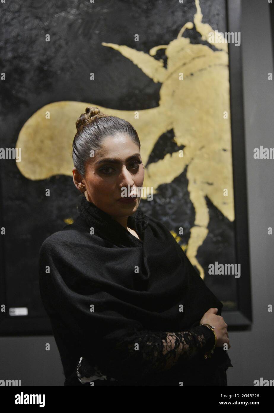 Pakistani visual artist Amna Butt gives tour to guests of her visual art hand made - painting ...