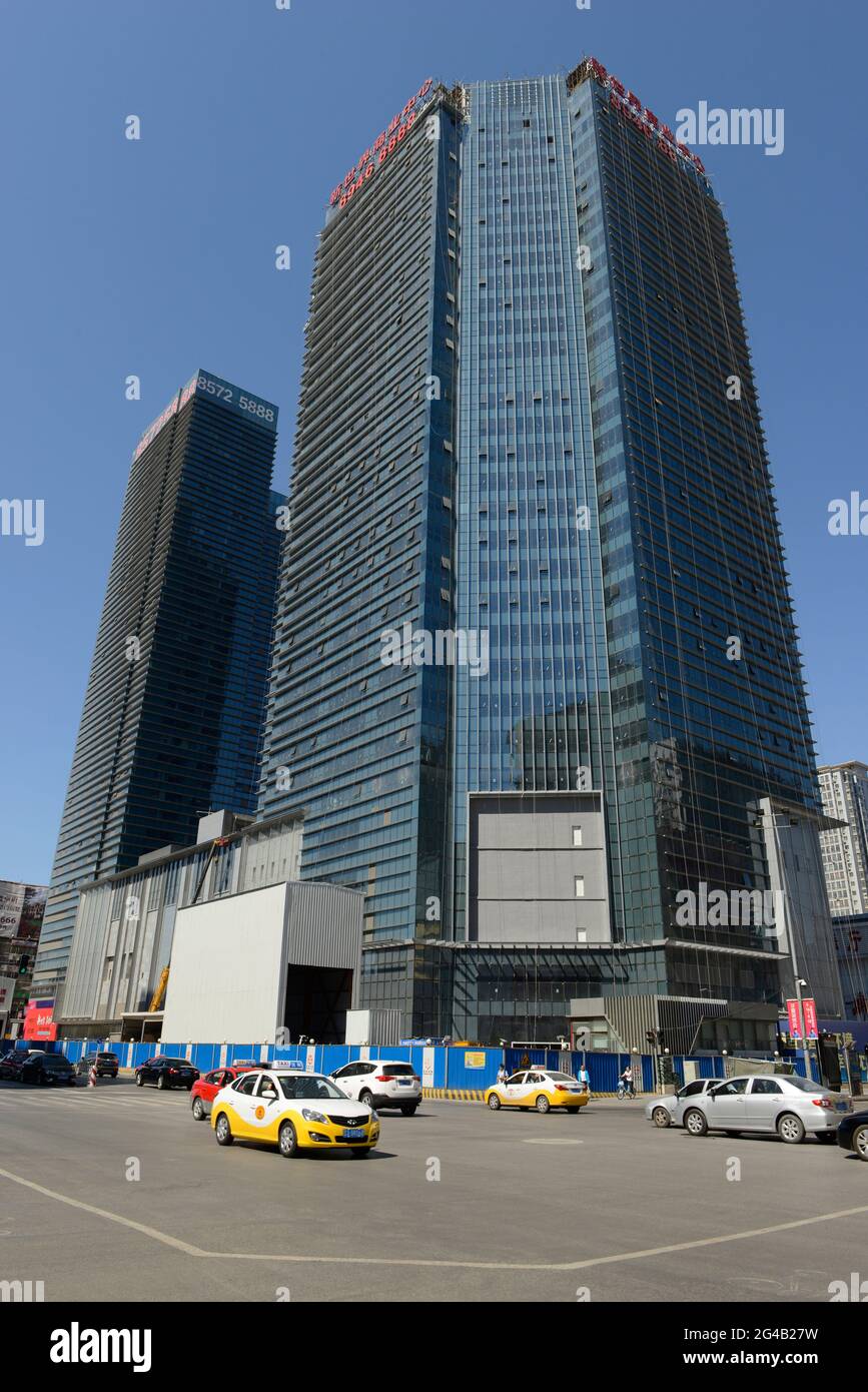 A two-towered office building near completion in central Shenyang ...