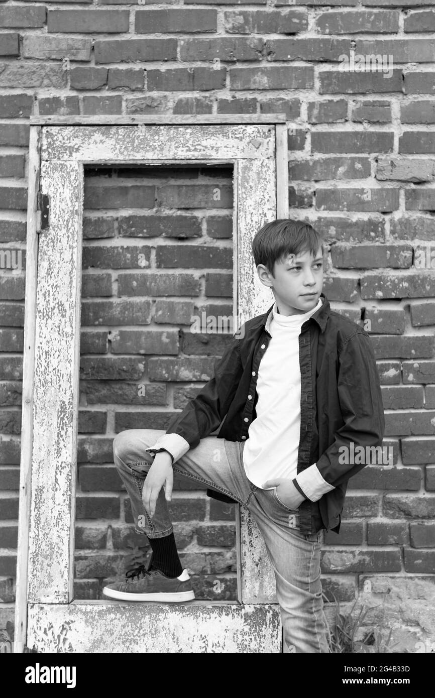 Black boy brick wall hi-res stock photography and images - Alamy