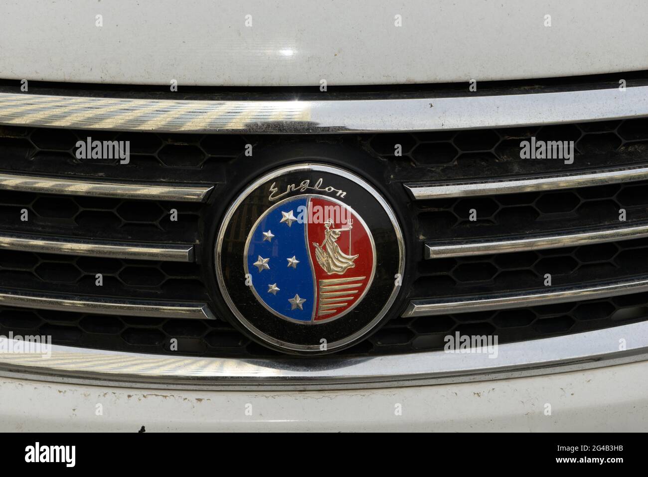 The logo of a rarely-seen Englon brand car sits in the centre of the ...