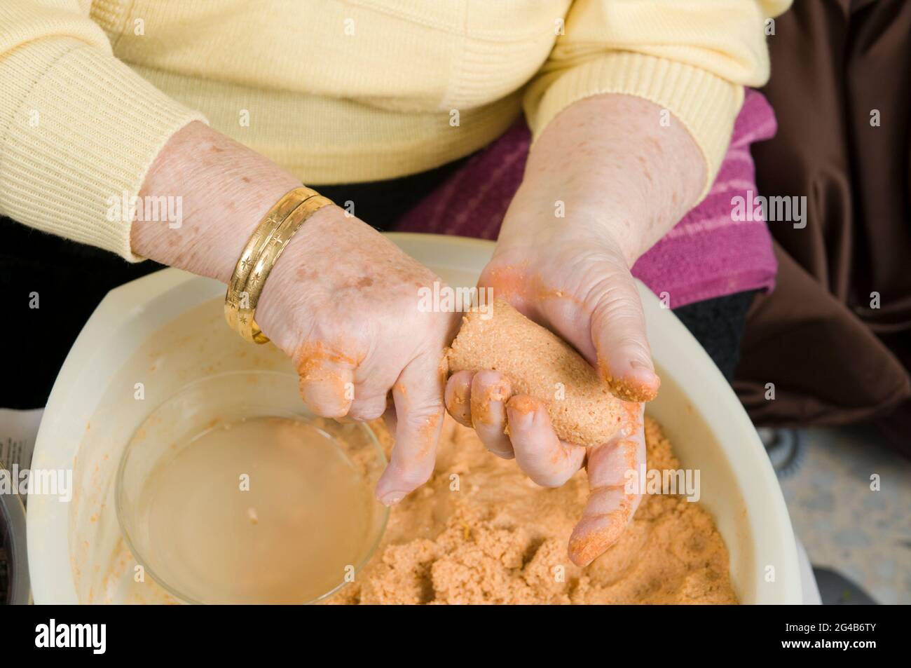 Preparing Kibbeh (Also Kibbe, Kubbah, Kubbeh) Burghul shell stuffed ...