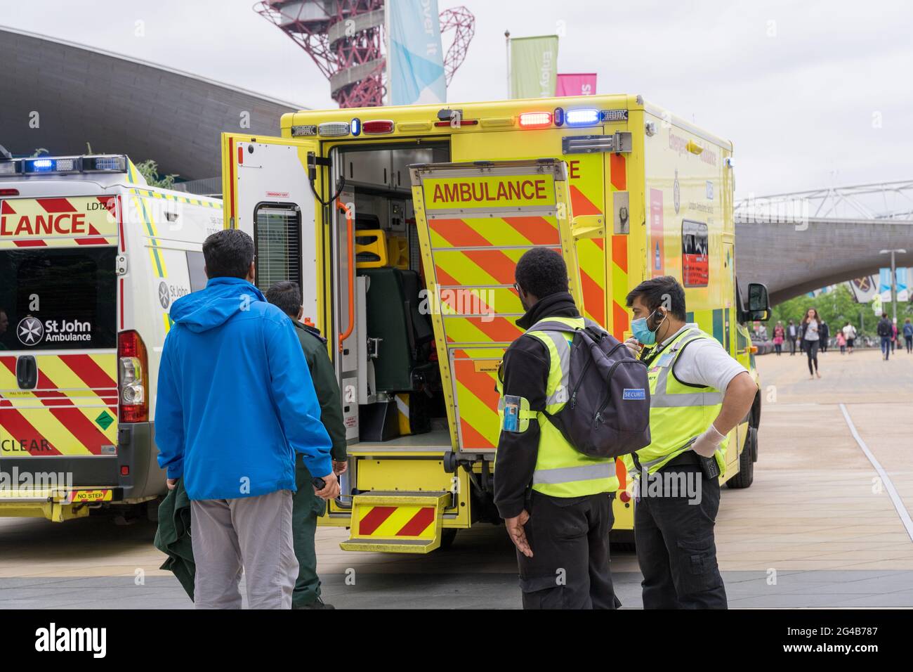 Medics from st johns ambulance and London ambulance services attend a ...