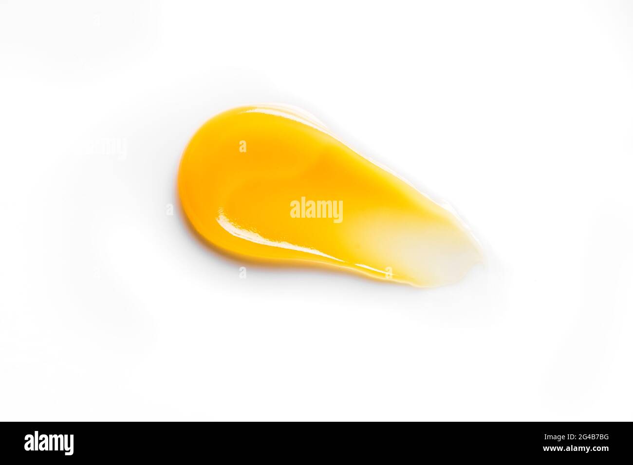 Orange gel sample isolated on white background, close up. Texture of ...