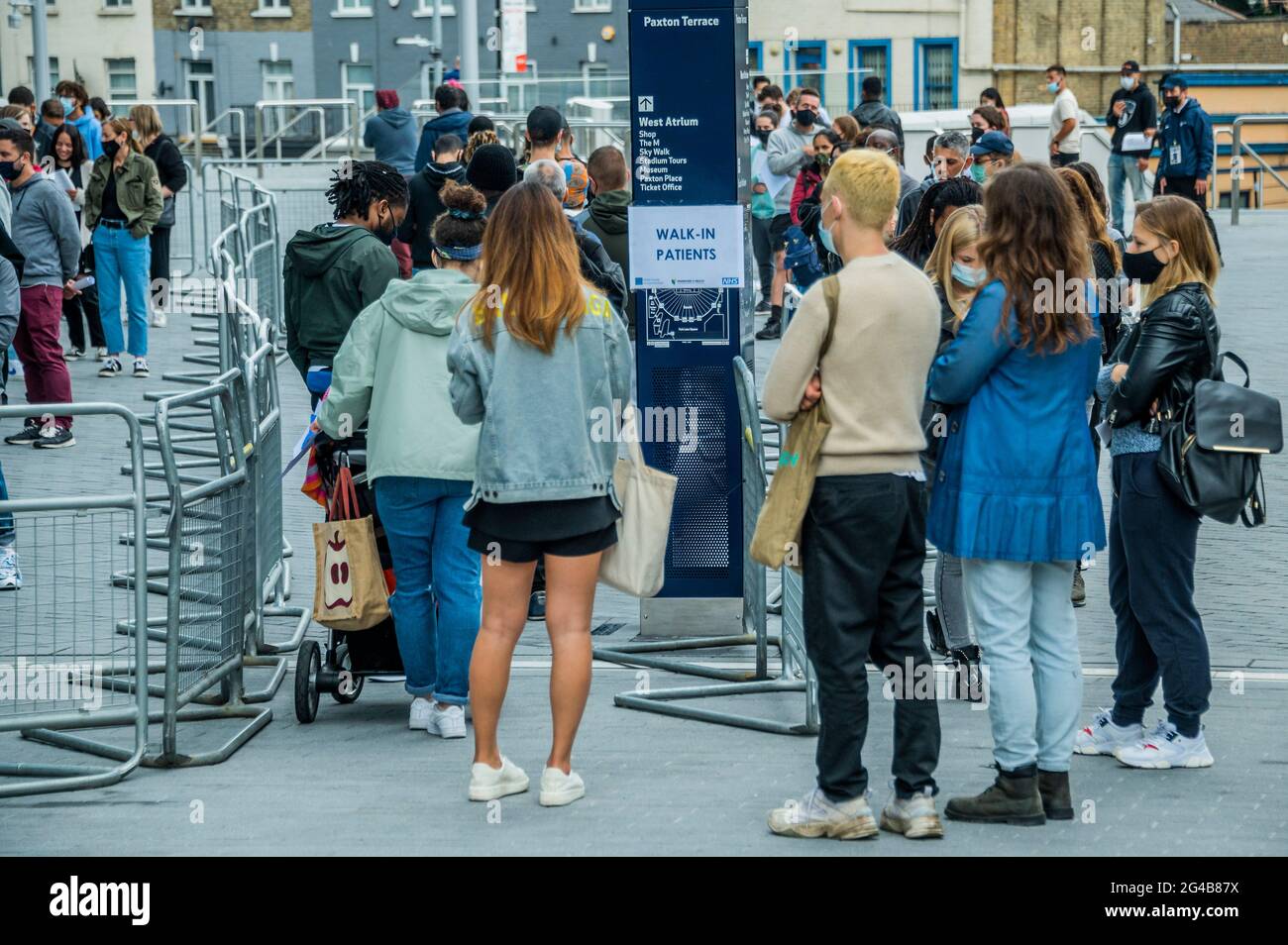 London, UK. 20th June, 2021. A steady walk-in queue outside - Mass ...