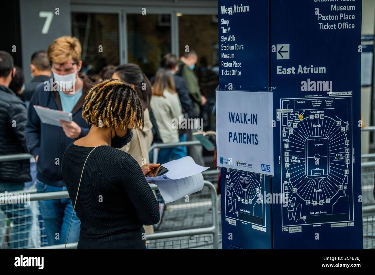 London, UK. 20th June, 2021. A steady walk-in queue outside - Mass ...
