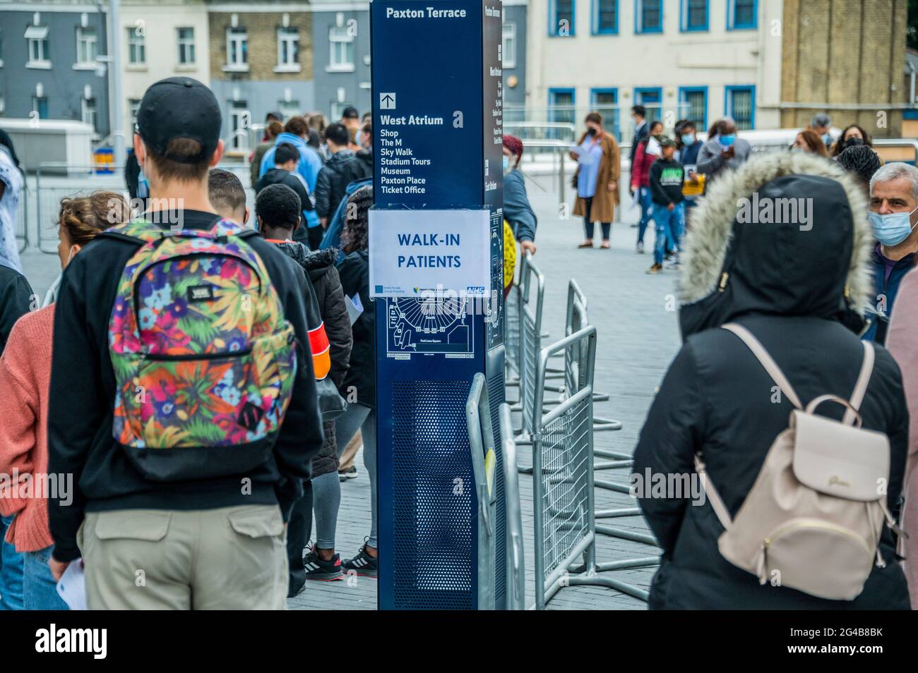 London, UK. 20th June, 2021. A steady walk-in queue outside - Mass ...