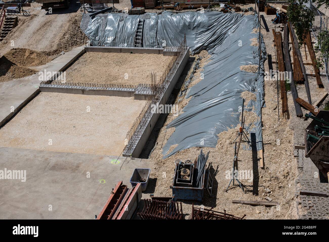 the concrete frame of a base plate filled with gravel, preparation for ...