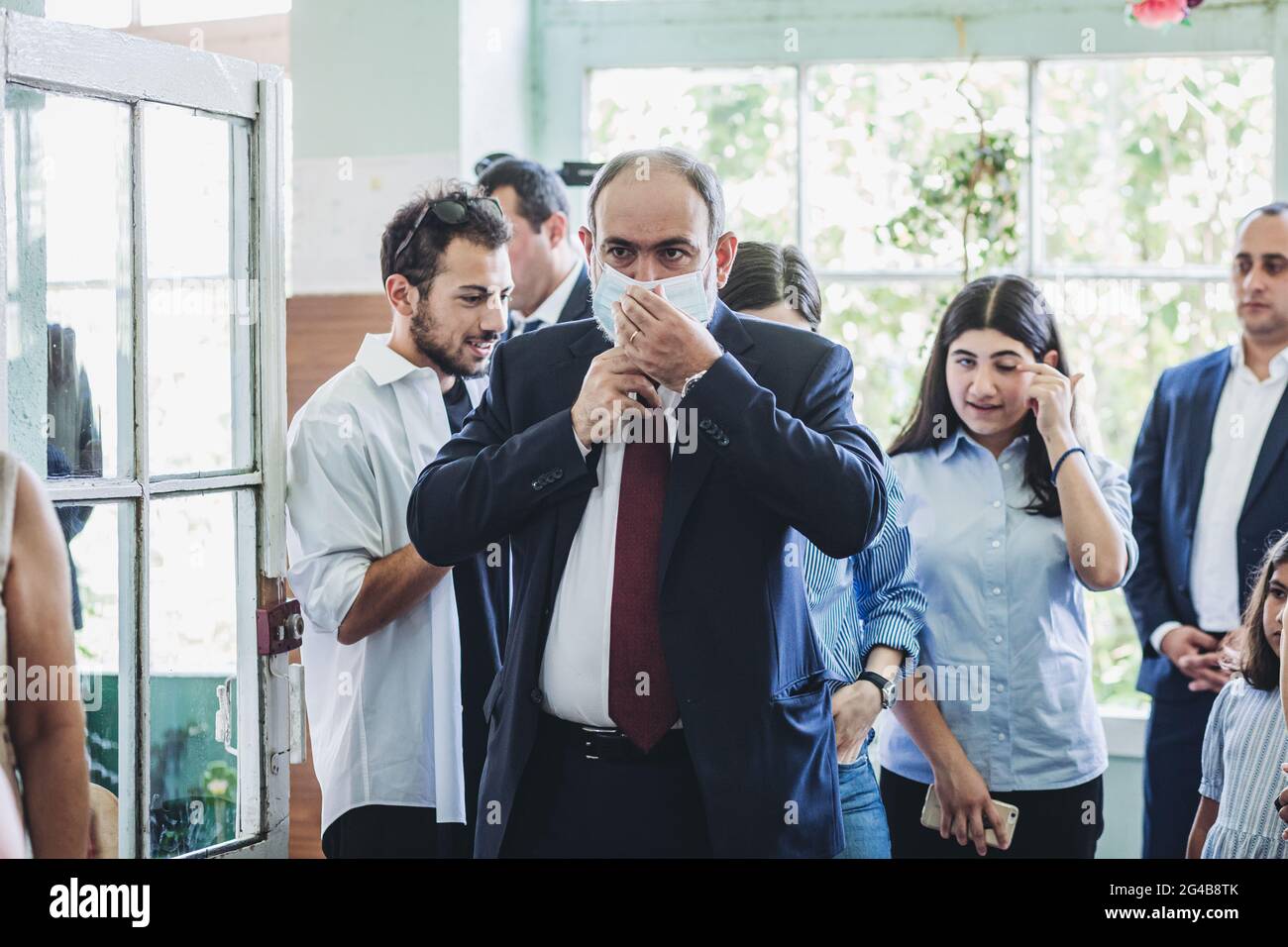 Nikol Pashinyan wears a face mask as he arrives at a polling station in ...