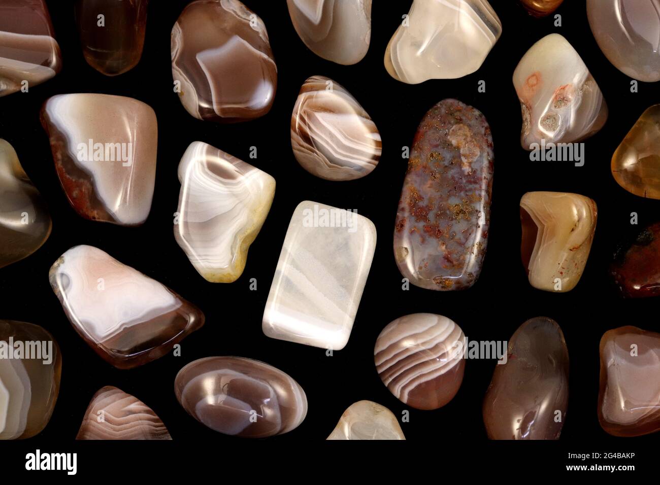 Persian agate rare jewel stones texture on black background Stock Photo ...