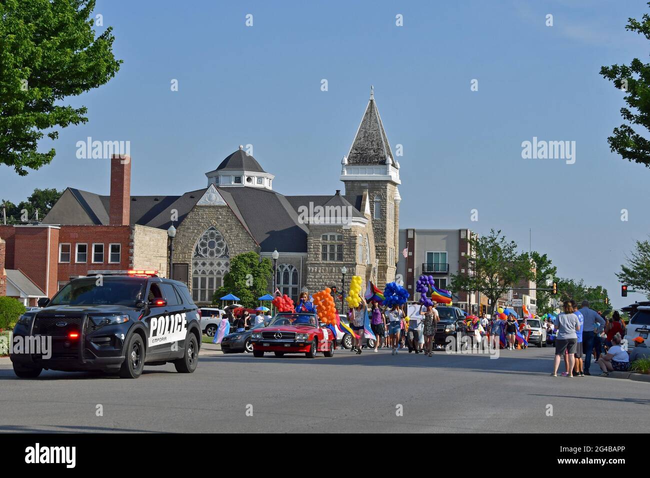 Local residents stand along Commercial street to view the first ever ...