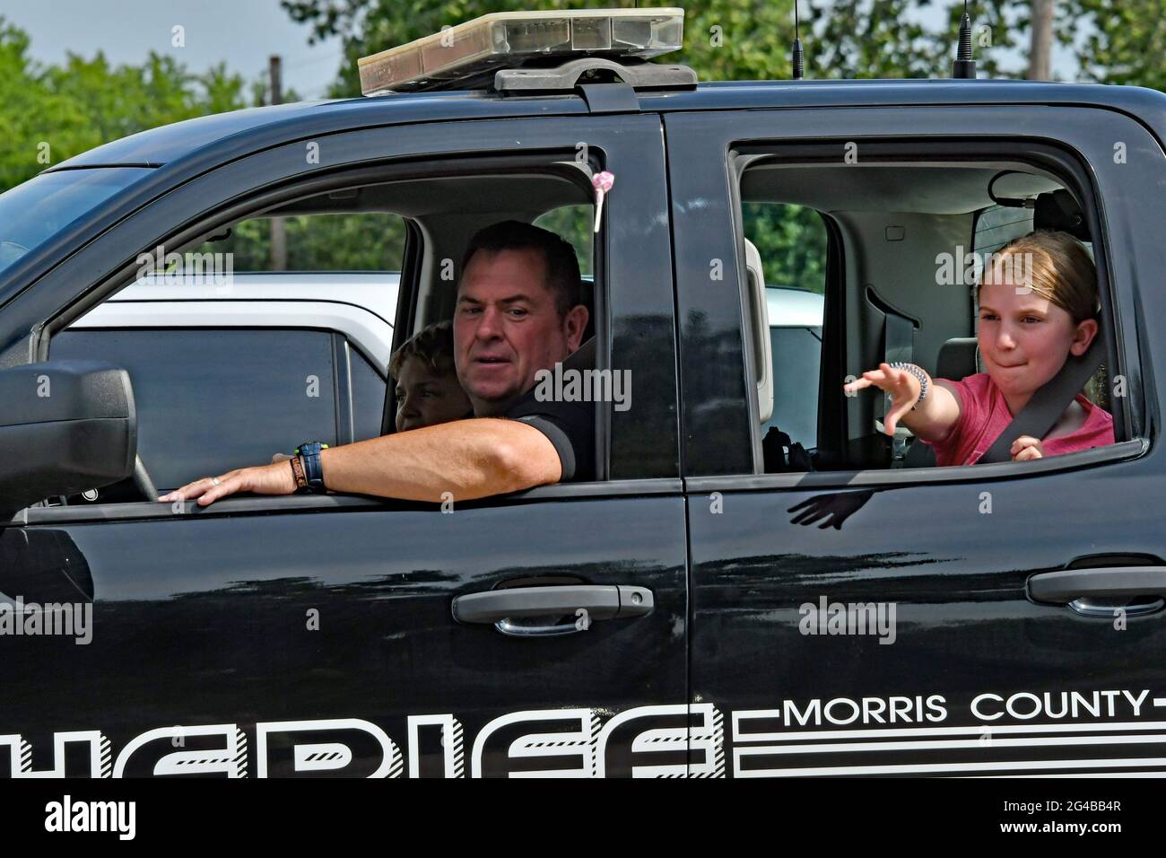Morris County Sheriff Jay Simecka drives his patrol car in the Washunga ...