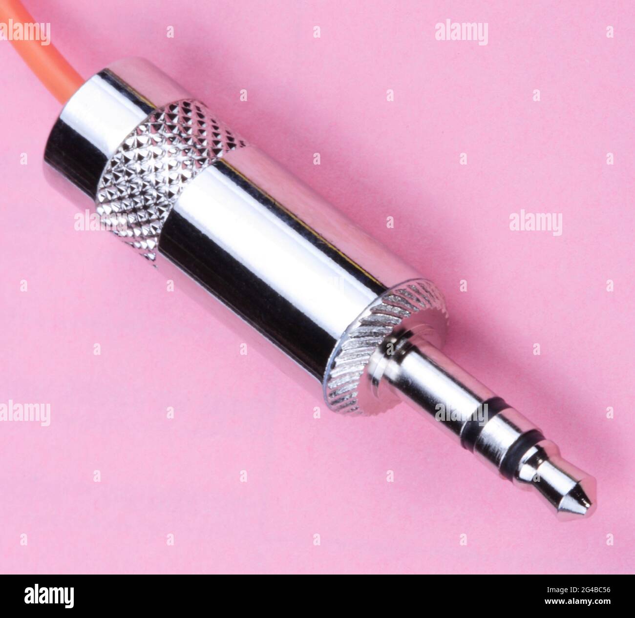 Stereo Male Plug Connector on Pink Background Stock Photo - Alamy