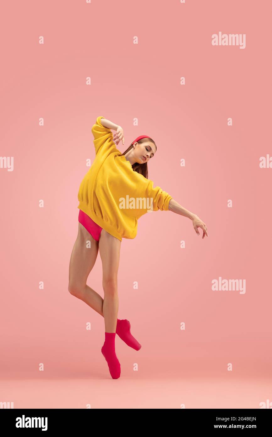Slim tender young beautiful girl, female ballet dancer dancing isolated ...