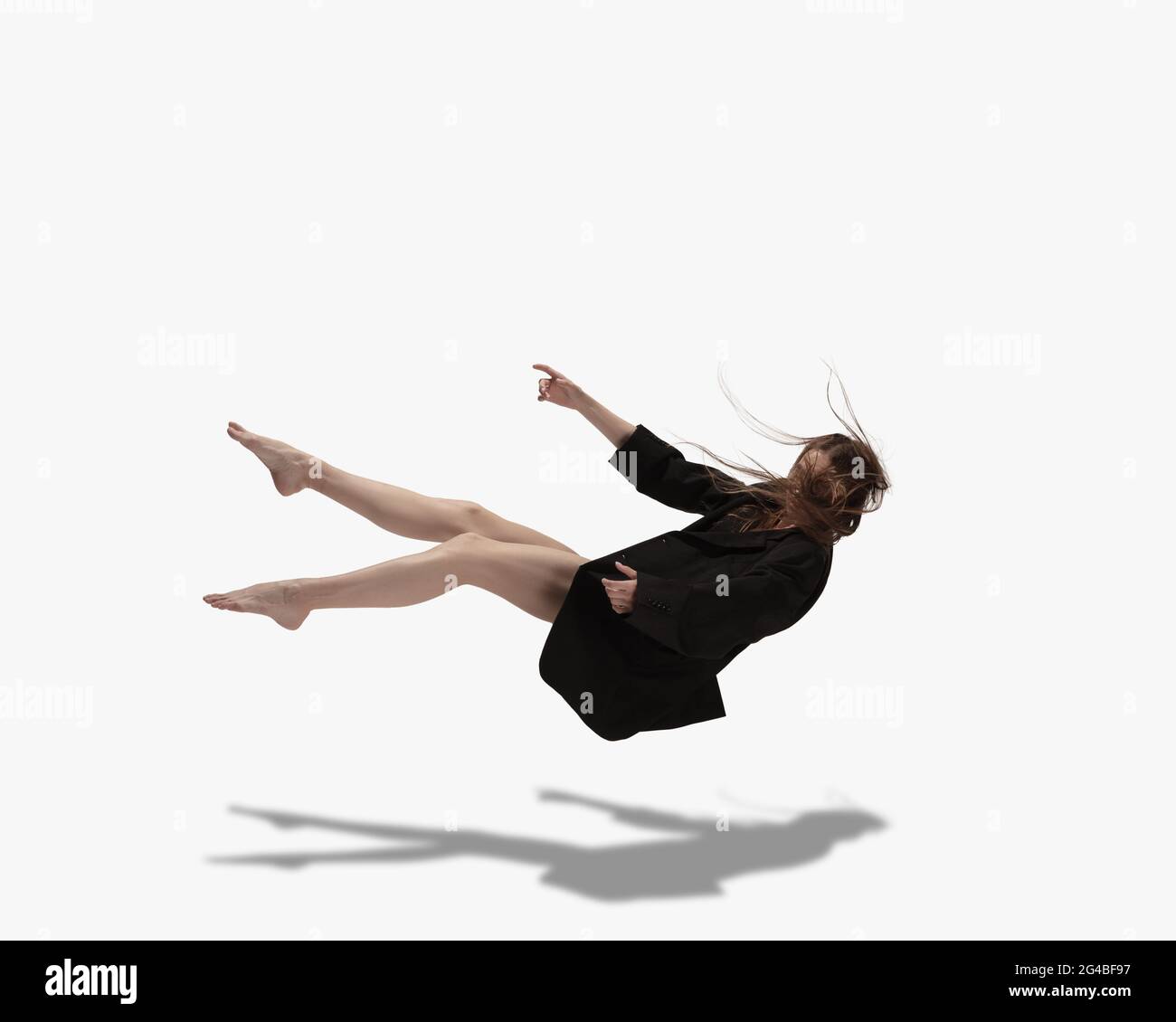 Soar up. Young beautiful girl, female ballet dancer dancing isolated ...