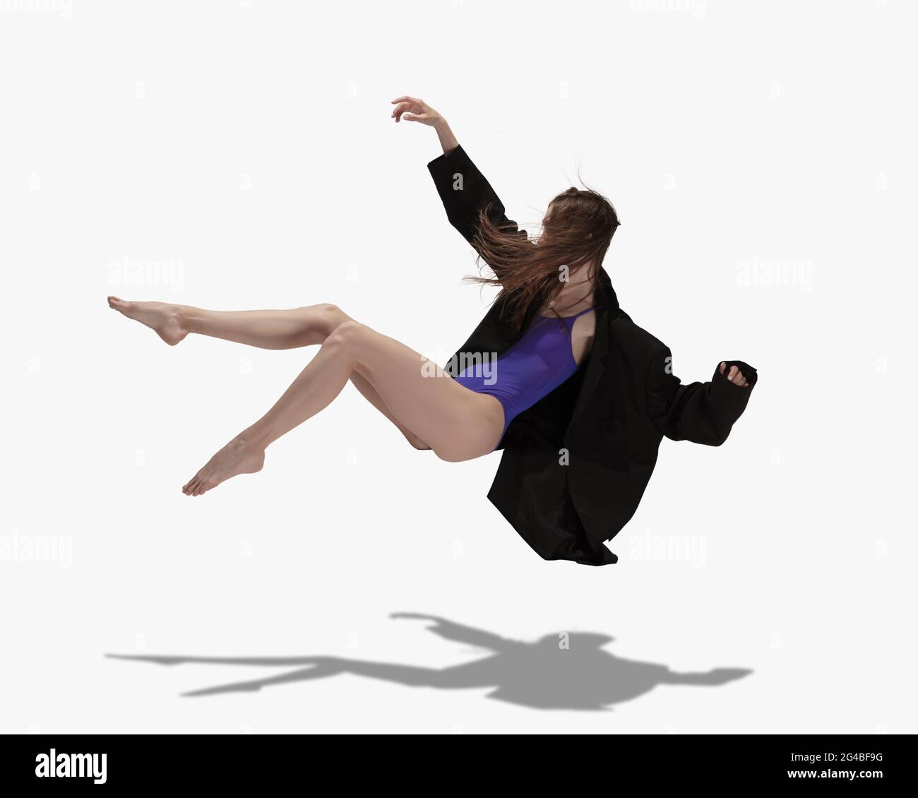 Soar up. Young beautiful girl, female ballet dancer dancing isolated ...