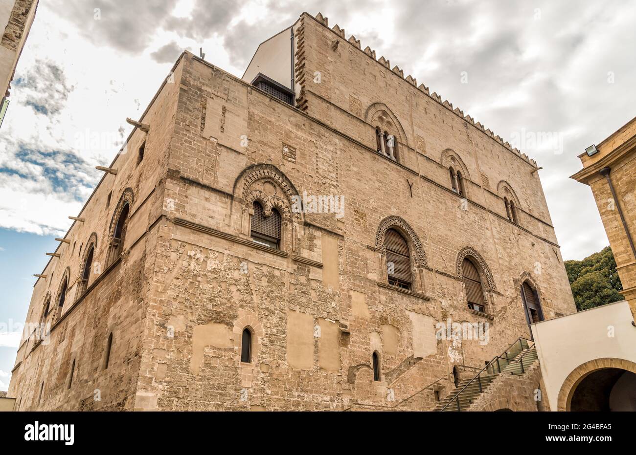 Wall with Mullioned windows with lava stone inlays of the Steri ...