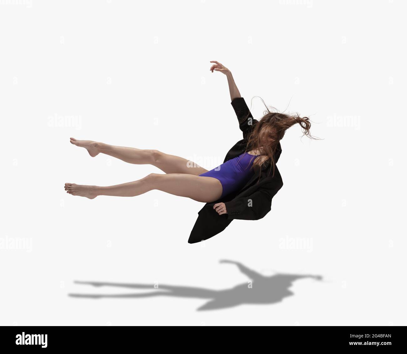 Flying. Young beautiful girl, female ballet dancer dancing isolated ...