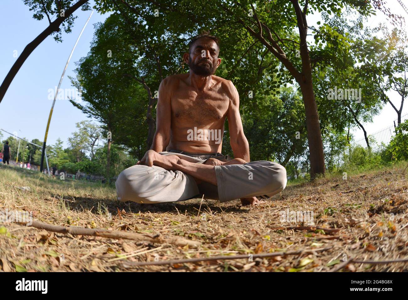 Pakistani people performing yoga session at the historical Shalimar ...