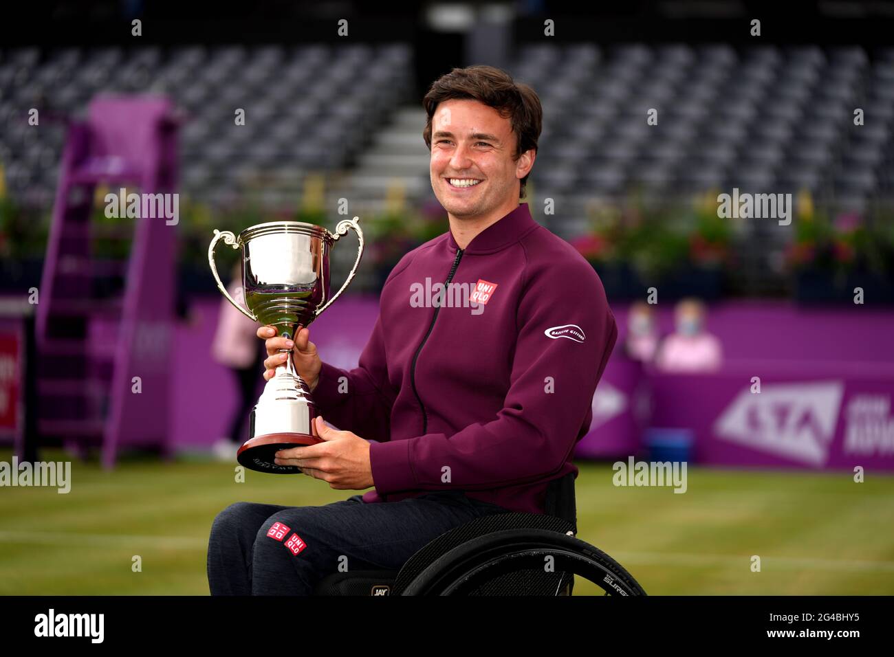 Great Britain's Gordon Reid poses with the trophy after winning the Men ...